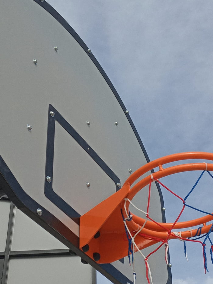 Basketball hoop with bolts and rivet heads on the backboard (Public ...