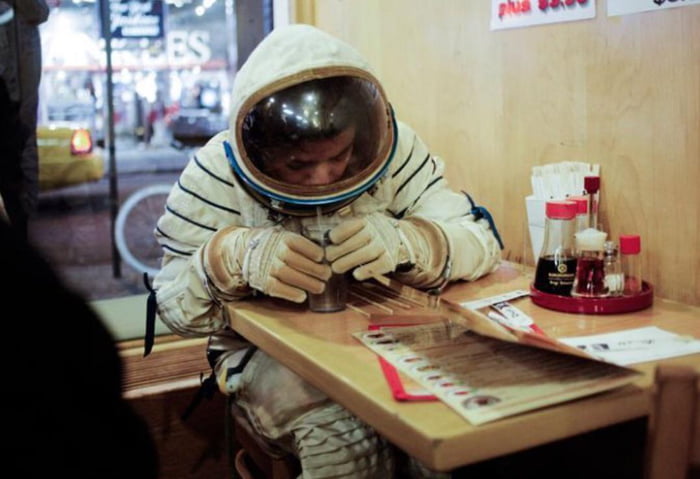 Neil Armstrong takes a lunch break while filming the Moon Landing ...