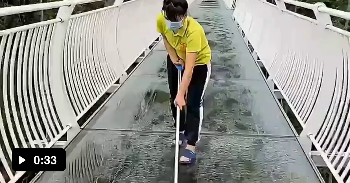 Cleaning glass sky bridge - 9GAG
