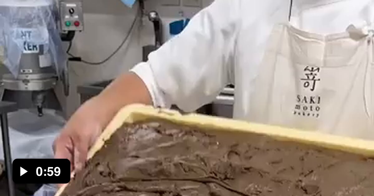 The Japanese baker's meticulous process of creating marbled fluffy bread is a true delight ...