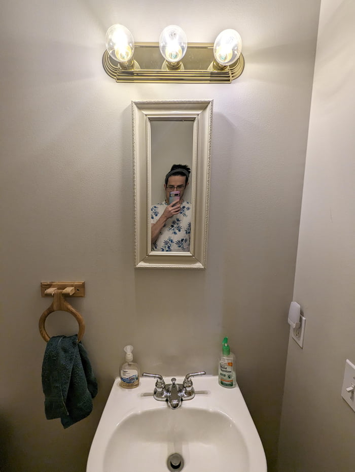 Tiny undersized bathroom vanity mirror, in an Airbnb of course - 9GAG