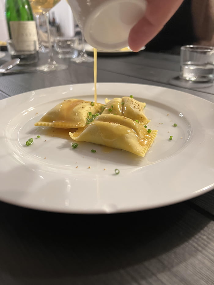 Doppio ravioli with duck confit and orange gastrique - 9GAG