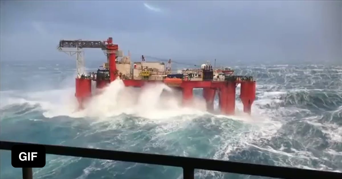 Huge waves crash against swaying North Sea oil rig - 9GAG