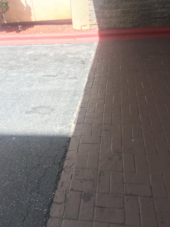 This shadow and where the brick meets asphalt - 9GAG