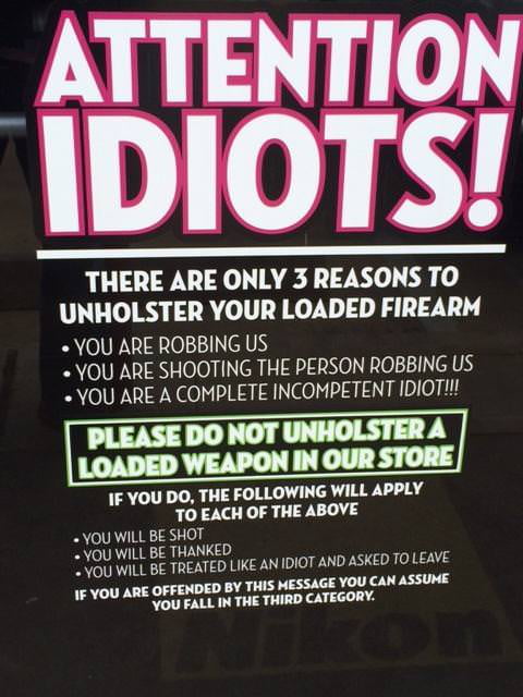 Sign on a gun store's front door - 9GAG