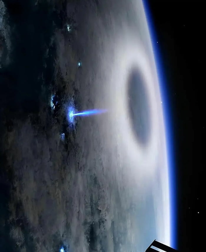 A blue jet (a type of upper atmospheric lighting taking place in the ...