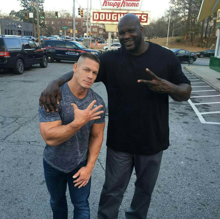 Shaq's hand covers John Cena's entire shoulder. - 9GAG