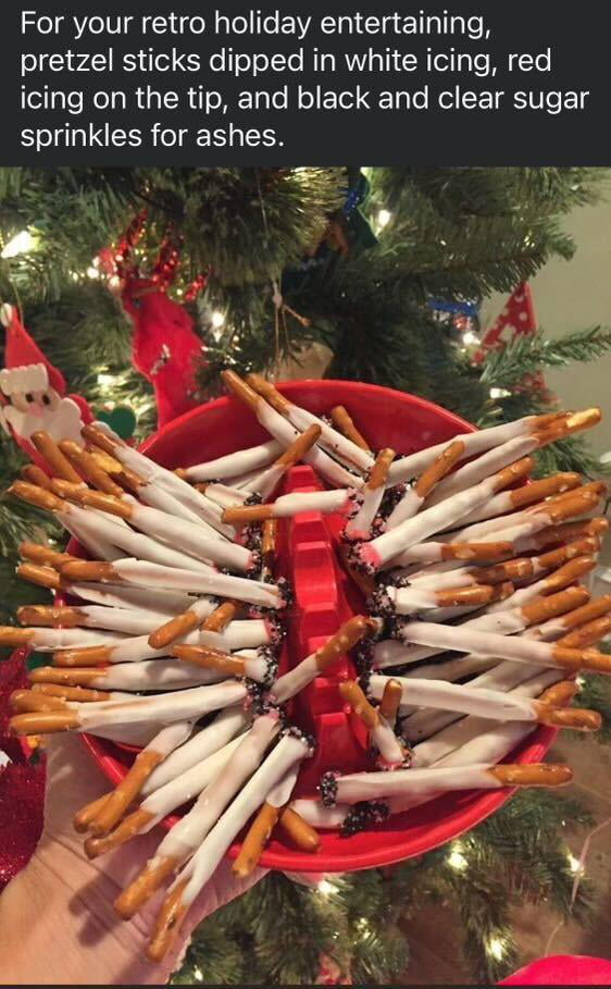 Used cigarettes in an ashtray: pretzel sticks, white and red icing, and ...